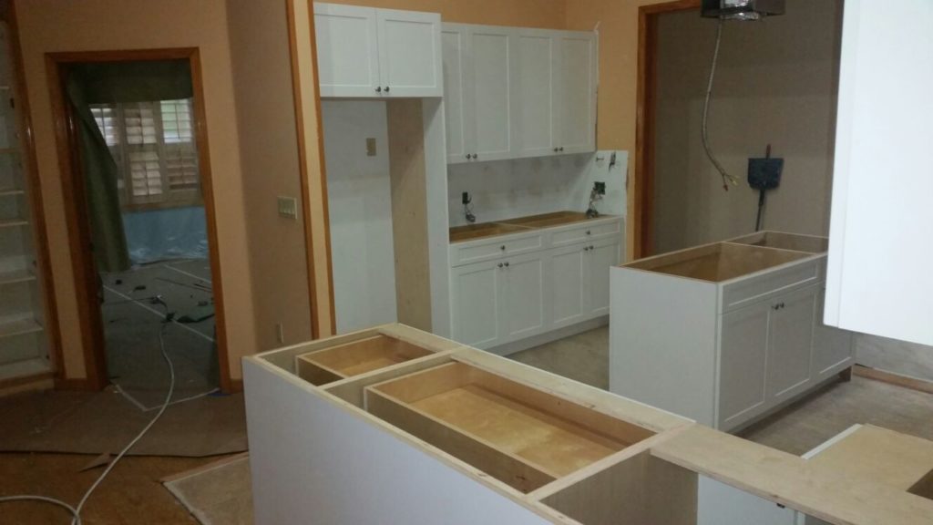 G-Shaped Kitchen Layout with Island — Miami General Contractor